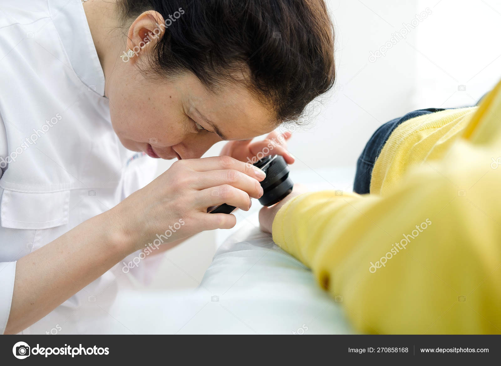 Female Dermatologist Using Professional Dermatoscope While Doing Skin ...