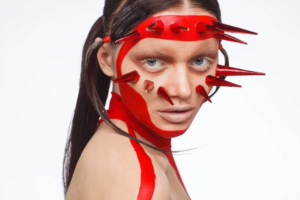 Portrait of an extraordinary model with creative makeup and hair ...