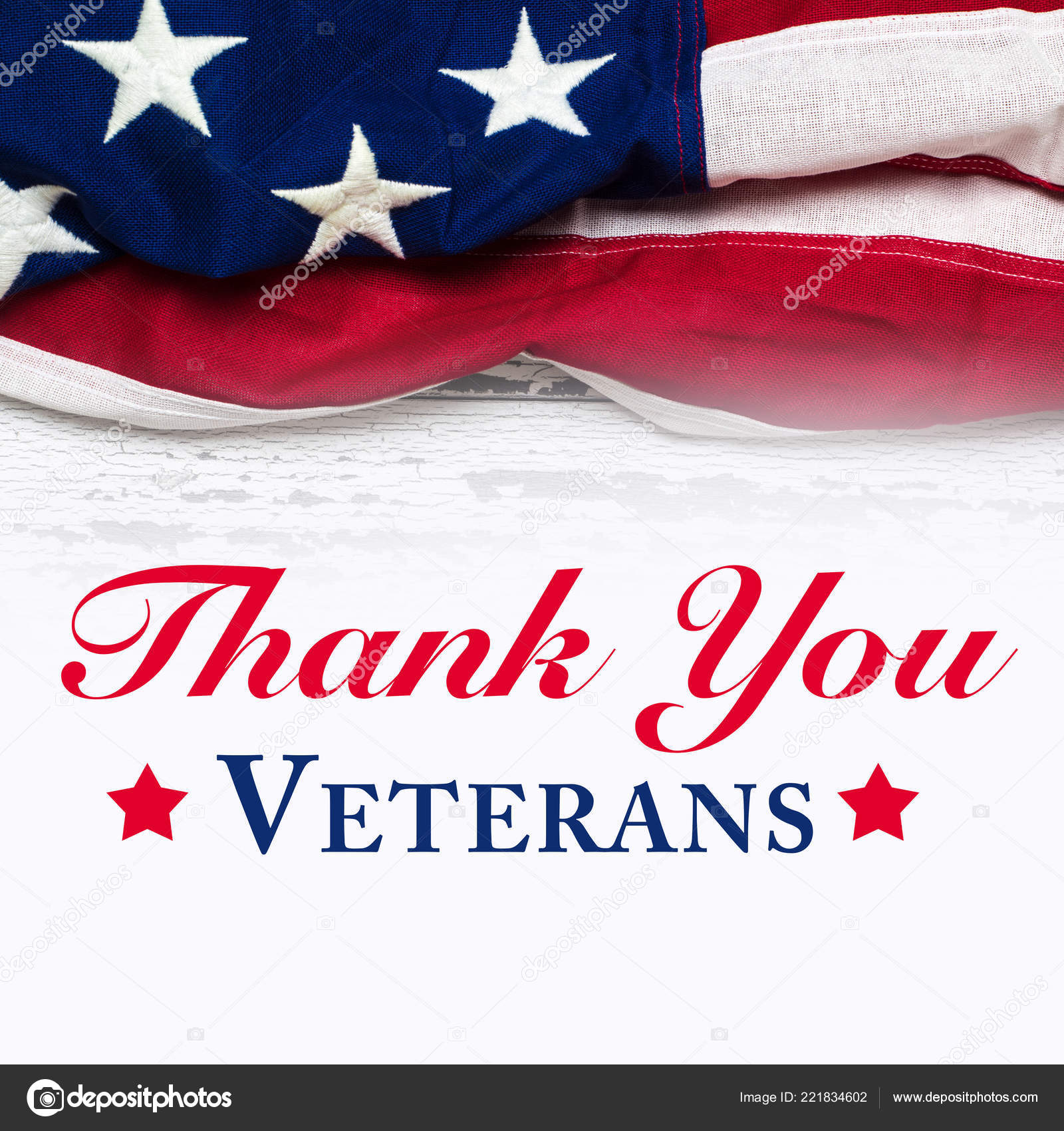 American flag on a white worn wooden background with veterans day ...