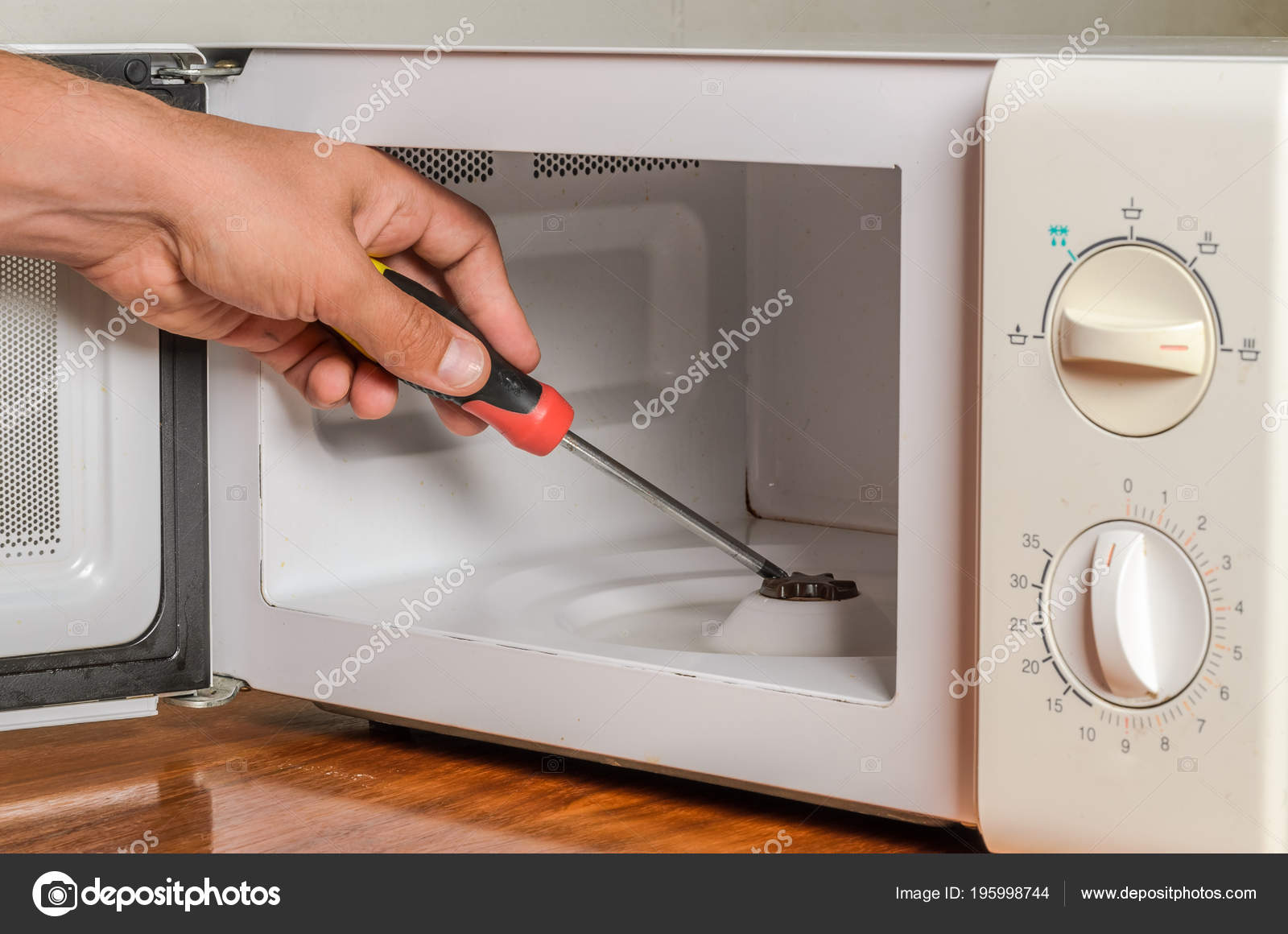Microwave Repair Master — Stock Photo © charlos.ukr.net #195998744