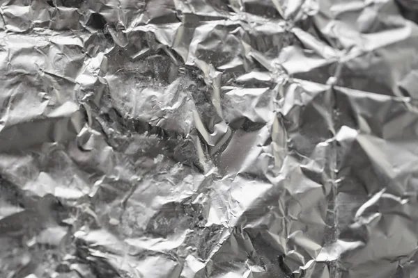 Silver crumpled foil shiny metal texture background wrapping paper for ...