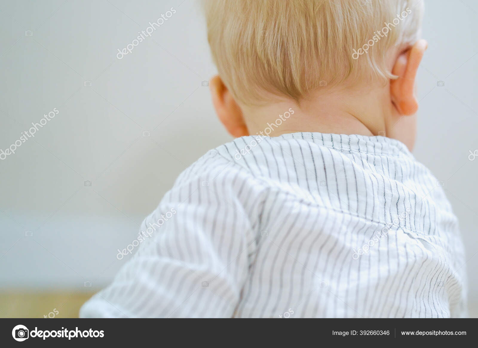 Back view of baby boy with blonde hair indoors — Stock Photo ...