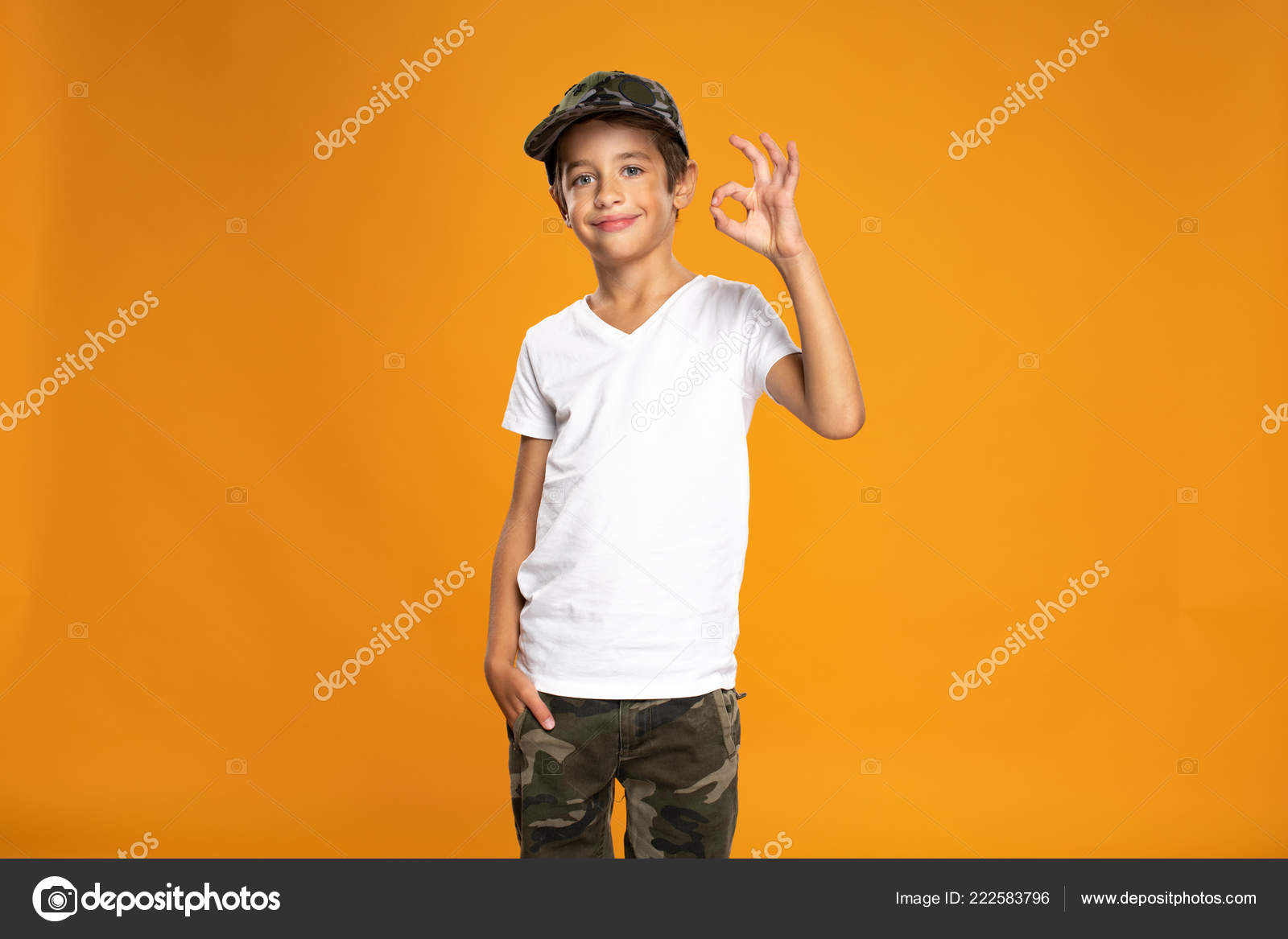 Happy Young Boy Yellow Background Stock Photo by ©path21 222583796