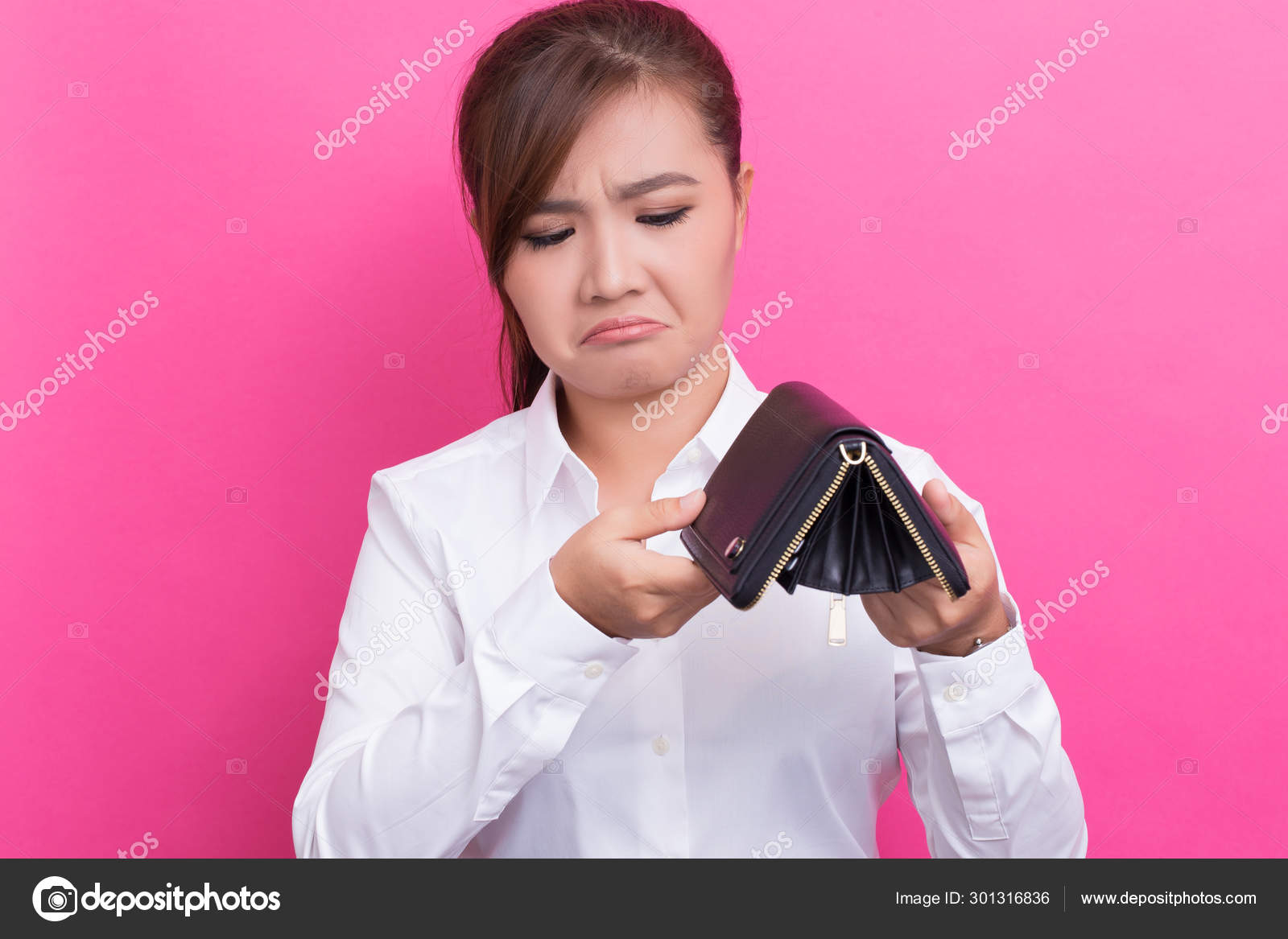 Poor woman with empty wallet Stock Photo by ©Champja 301316836
