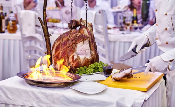 appetizing grilled meat on fire close-up. beautiful presentation of the ...