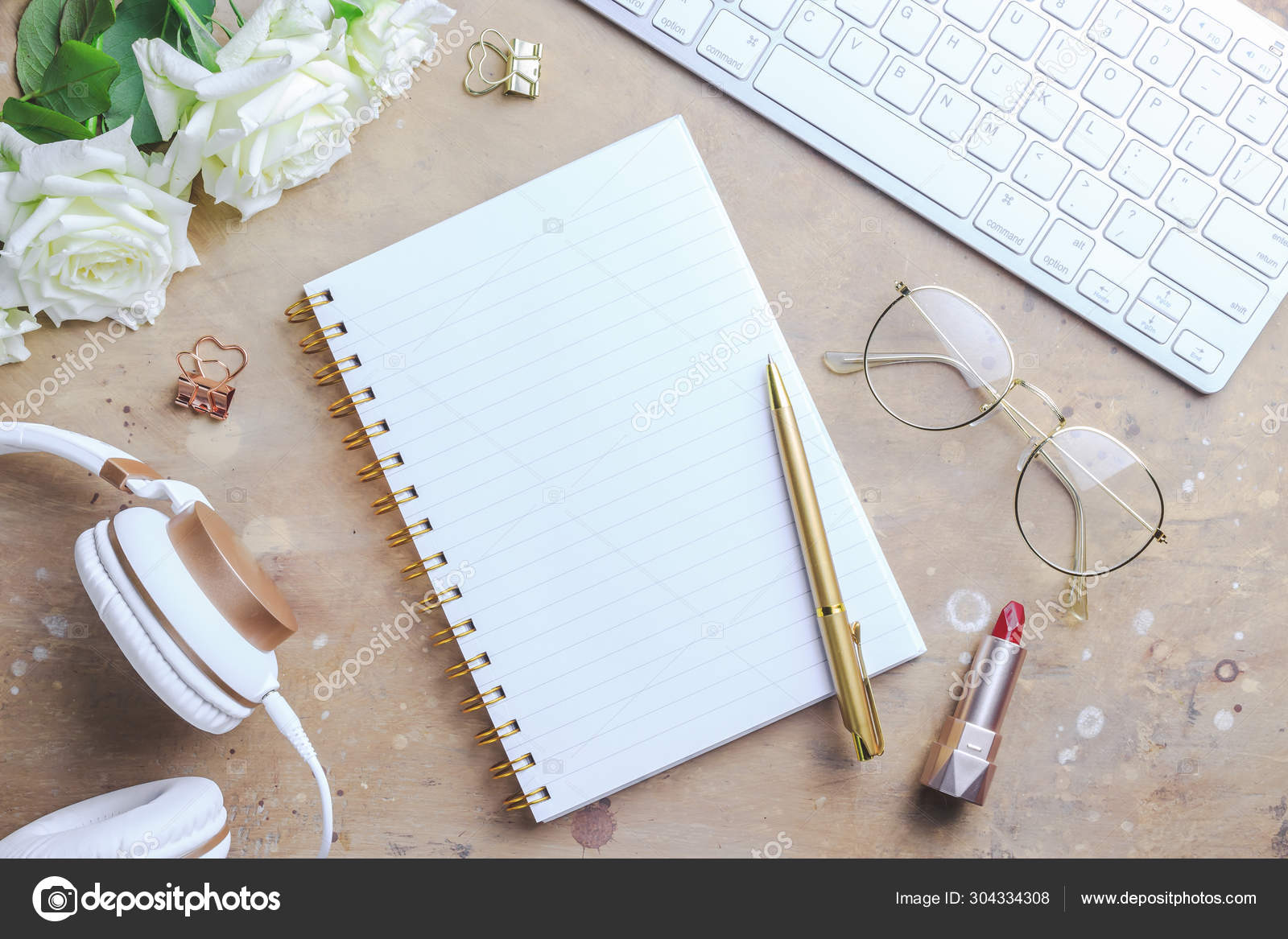 Office desk with computer and rose flowers Stock Photo by ...