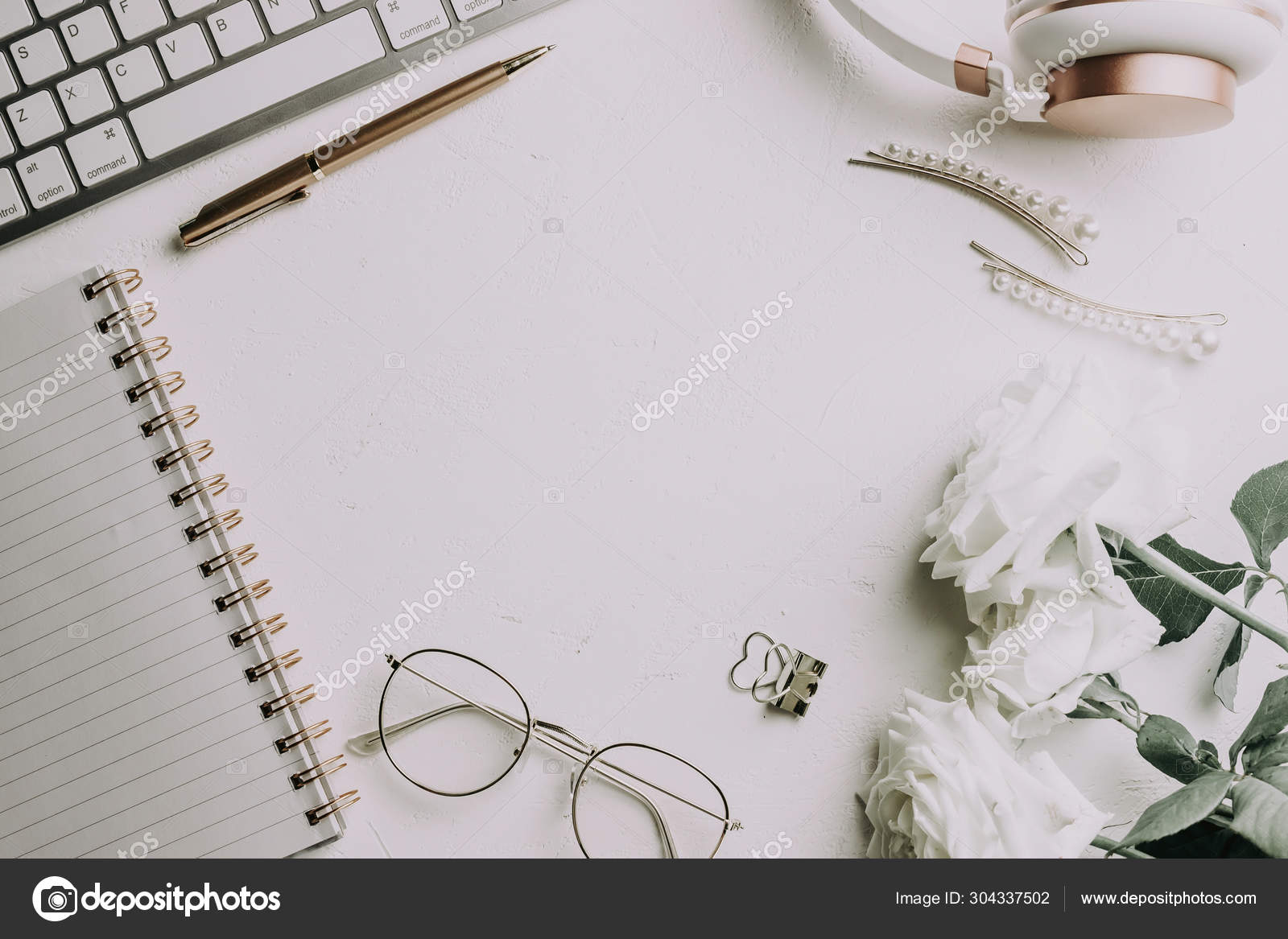 Office desk with computer and rose flowers Stock Photo by ...