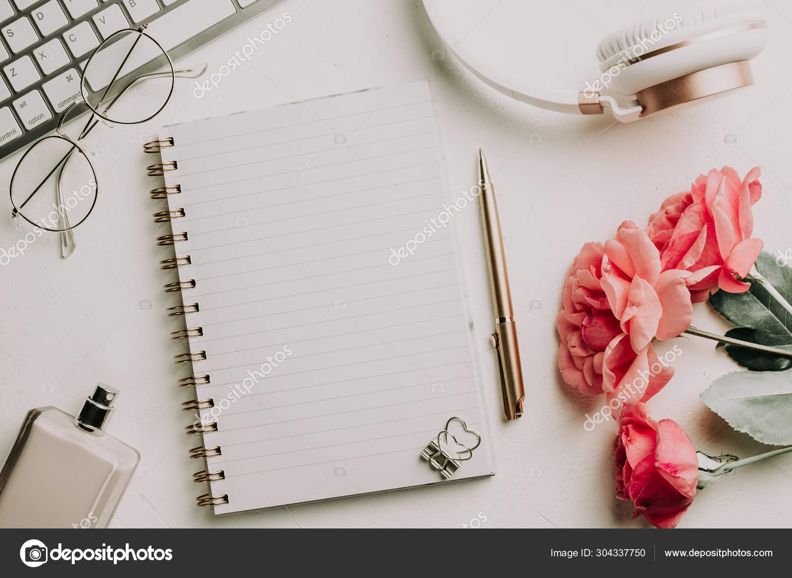Office desk with computer and rose flowers Stock Photo by ...