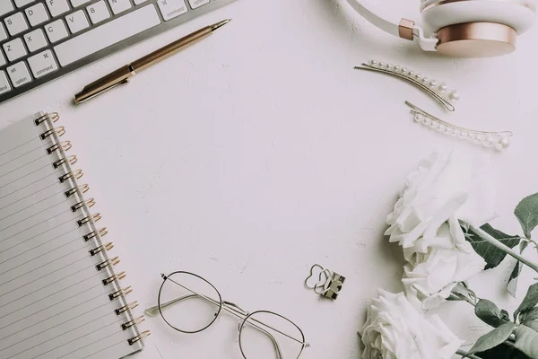 Office desk with computer and rose flowers Stock Photo by ...