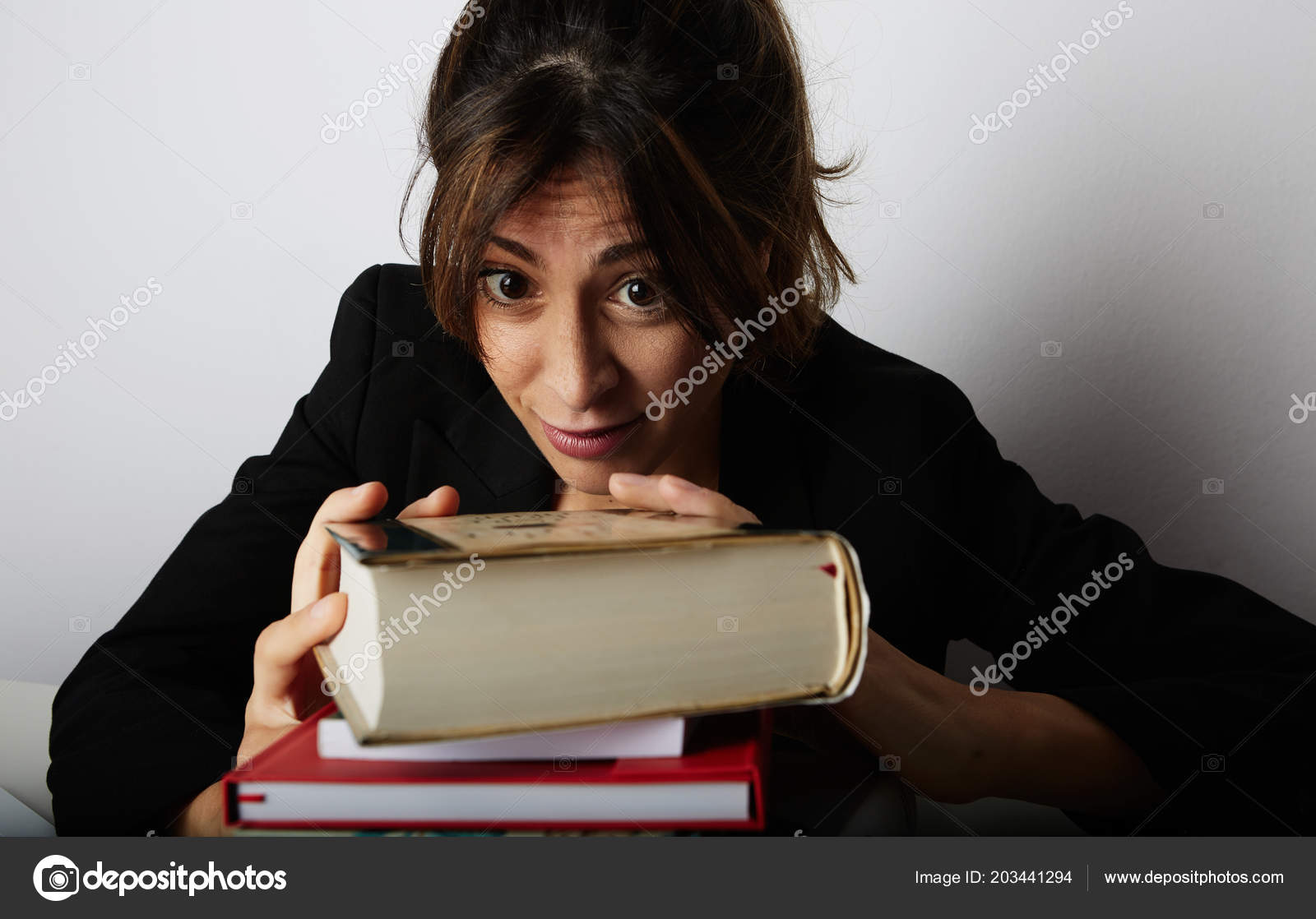 Overwhelmed Student With Books