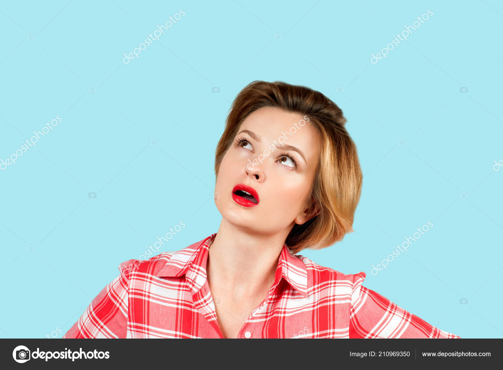 Young Thinking Business Woman Questioning Face Expression Looking Blue ...
