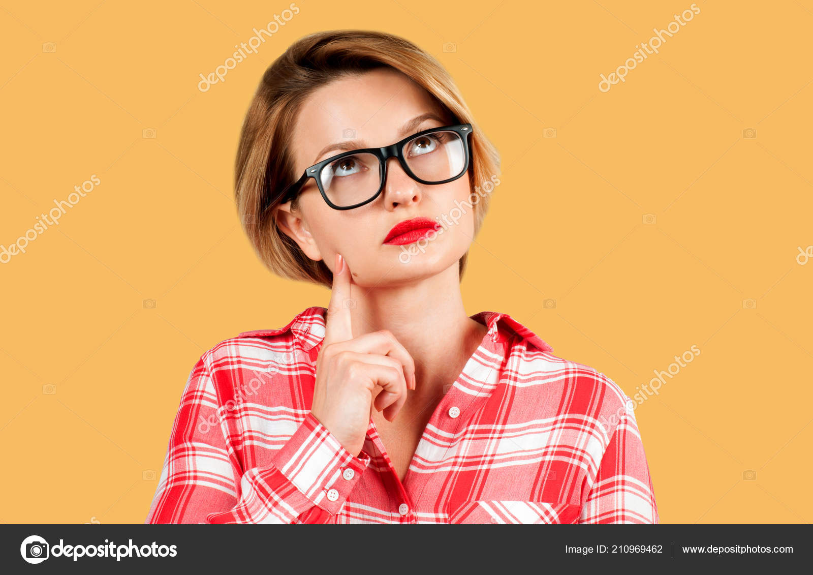 Young Thinking Business Woman Questioning Face Expression Looking ...