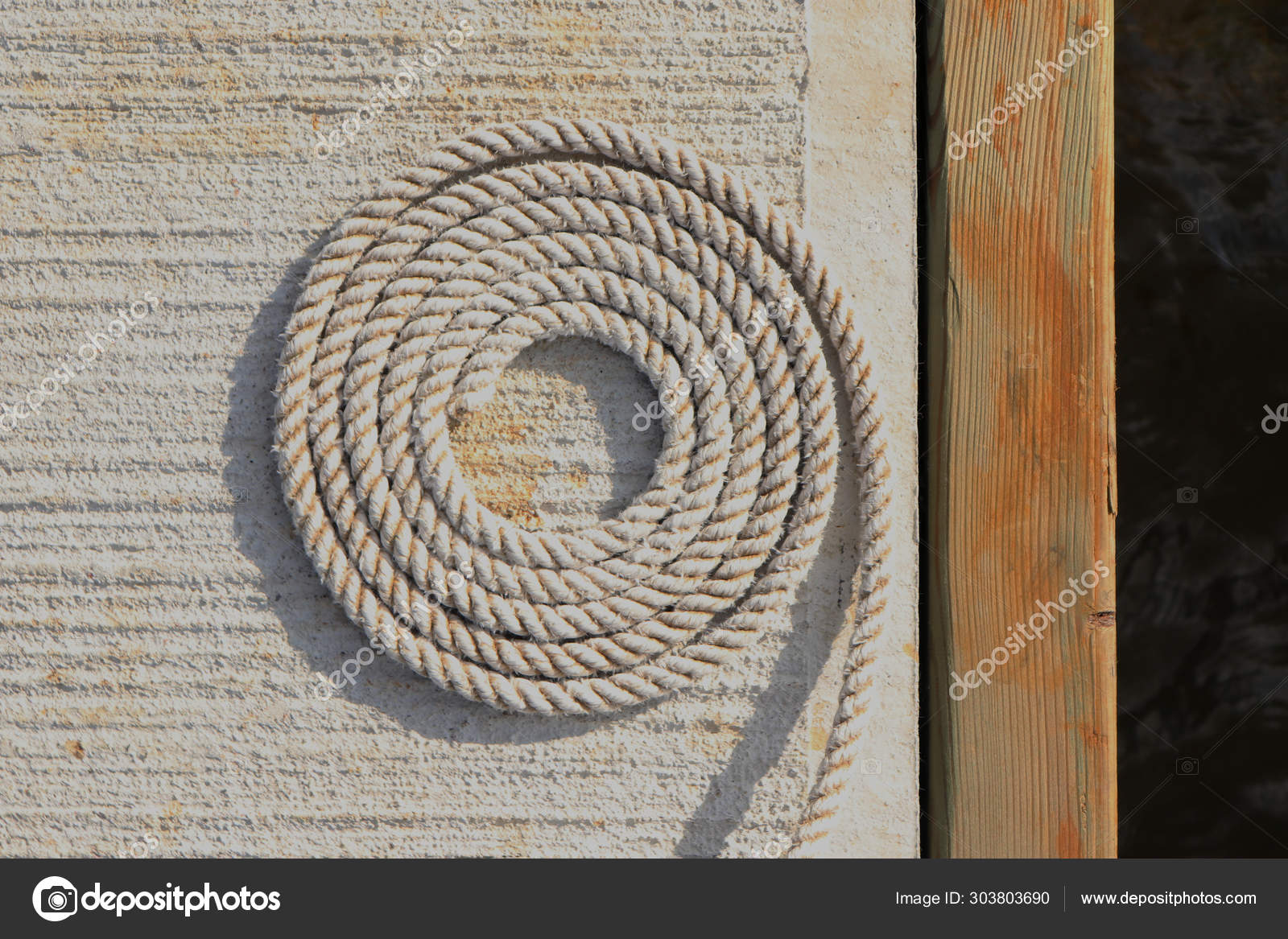 Sailing marine spiral rope on the pier. Rope snail nautical texture ...