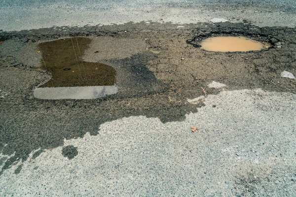 Asphalt pothole Stock Photos, Royalty Free Asphalt pothole Images ...