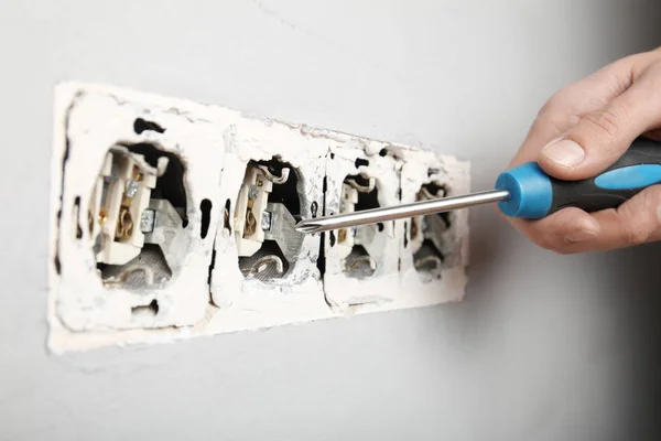 Electrical outlet repair Stock Photos, Royalty Free Electrical outlet ...