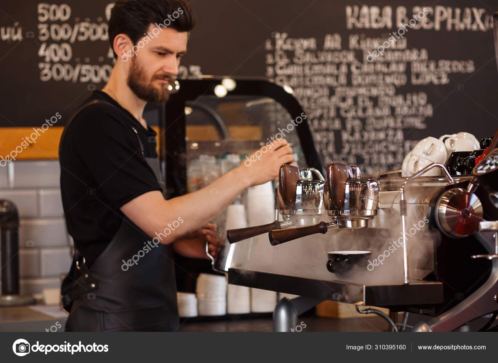 Young Smiling Male Barista Making Coffee Using Professional Coffee ...