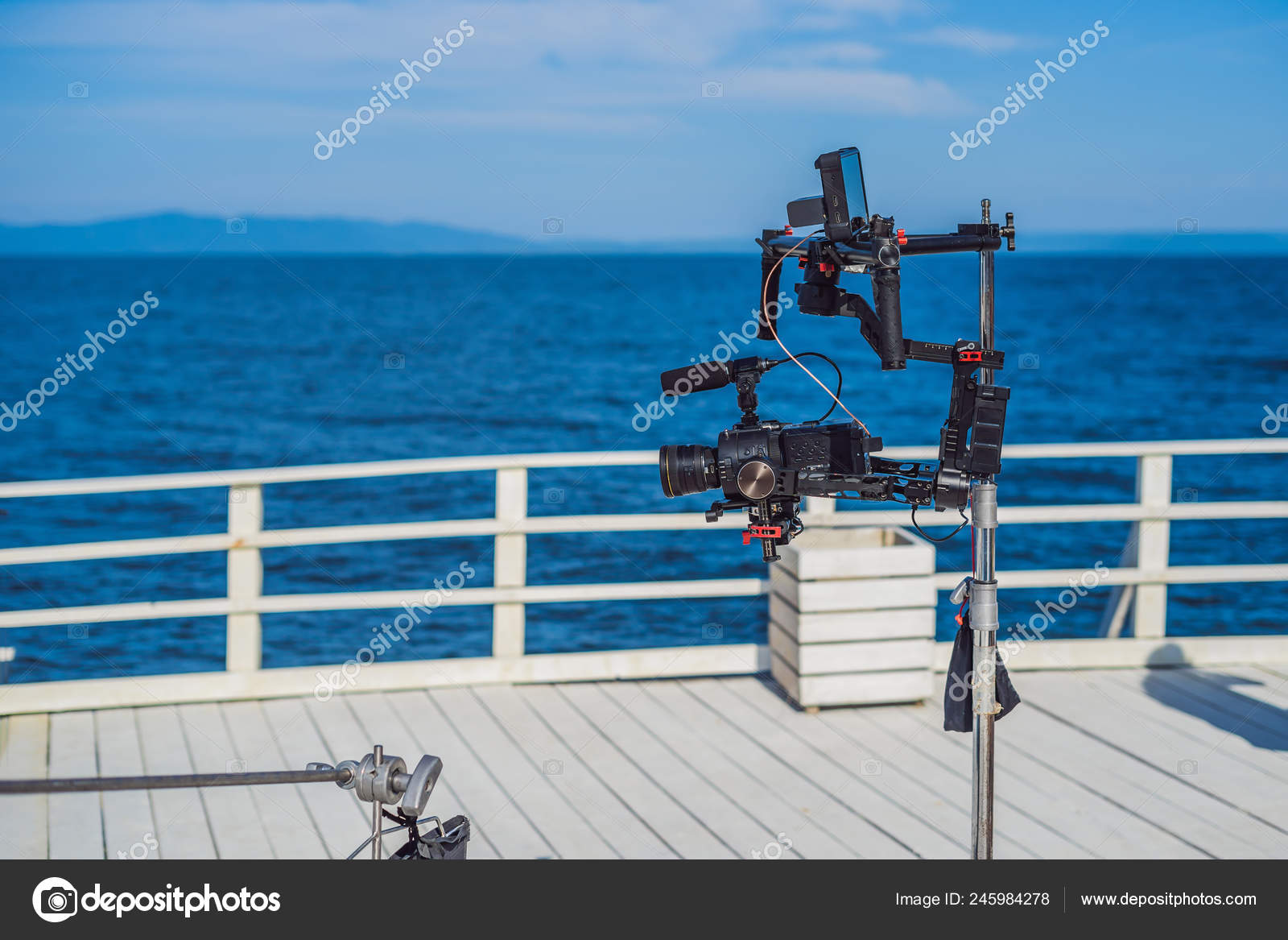 Profeccional cinema camera on a 3-axis camera stabilizer system on a ...