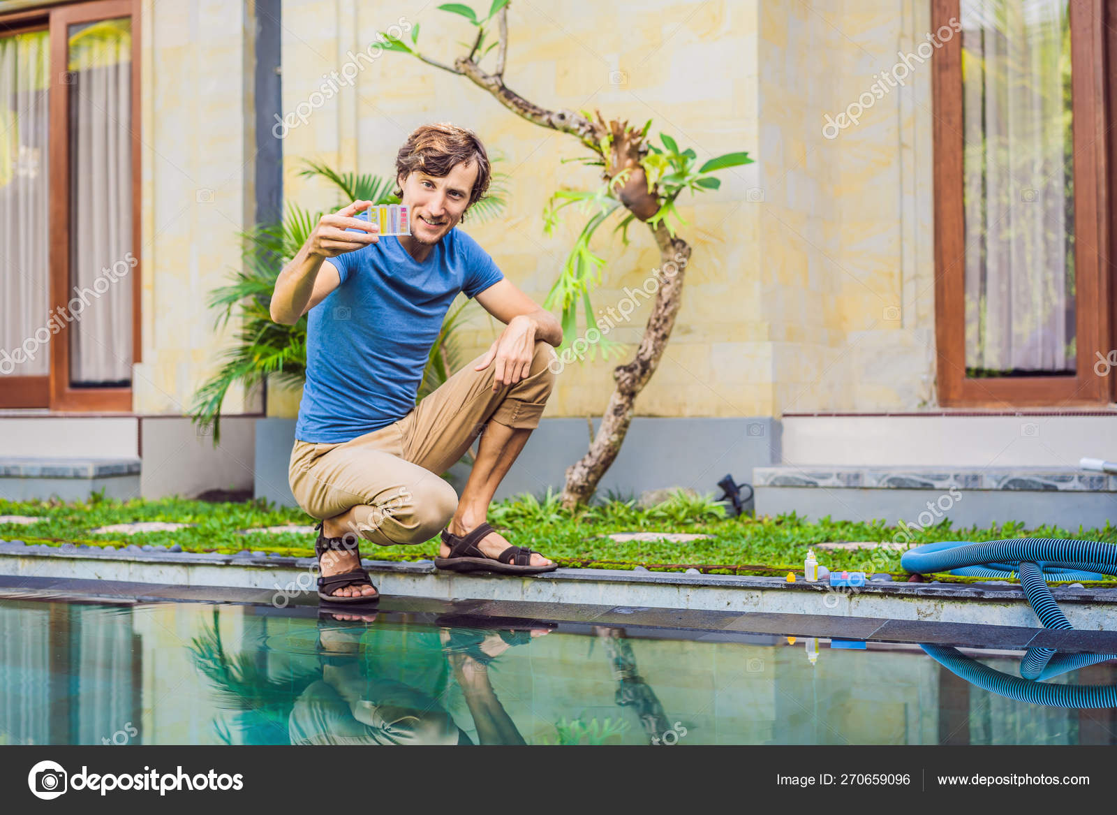 Pool worker checks the pool for safety. Measurement of chlorine and PH ...