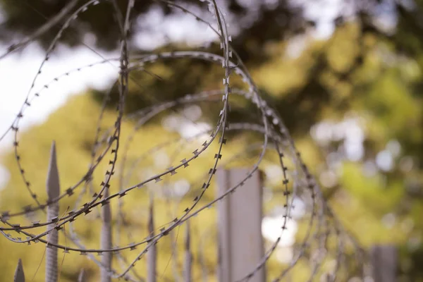 the wire is pulled on the fence closed area - Stock Image - Everypixel