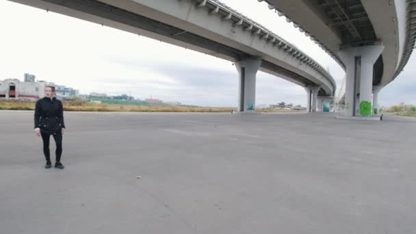 Girls jumping in a splits towards the camera on the background of the ...