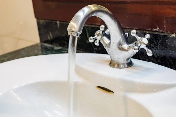 Overflowing faucet Stock Photos, Royalty Free Overflowing faucet Images ...