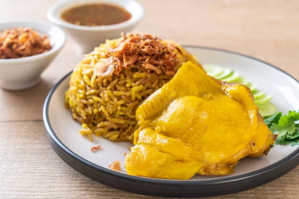 Muslim yellow rice with chicken - Muslim food style - Stock Image ...