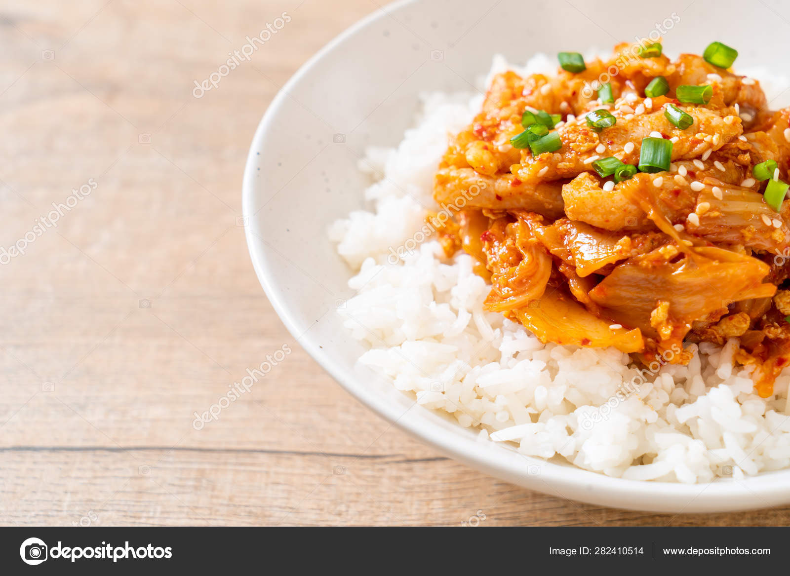 Stir-fried pork with kimchi on topped rice — Stock Photo © topntp ...