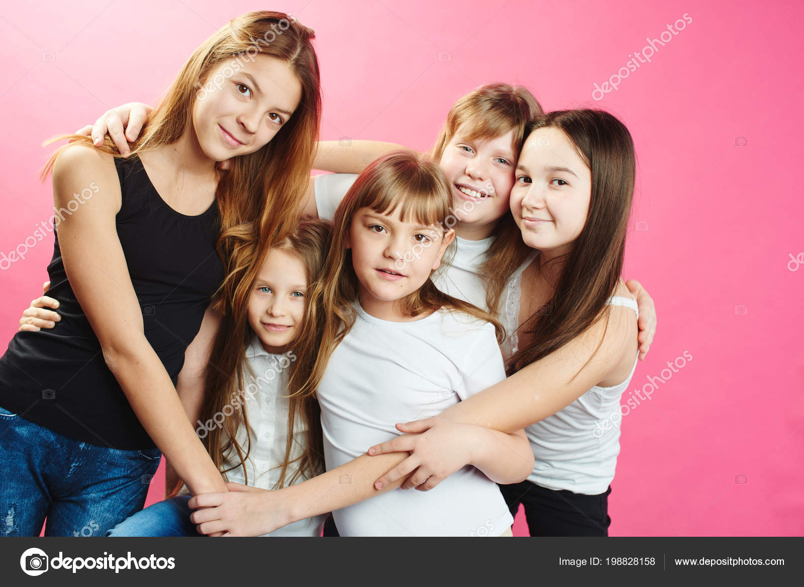 Group Cute Girls Hugging While Posing Pink Background Stock Photo by ...