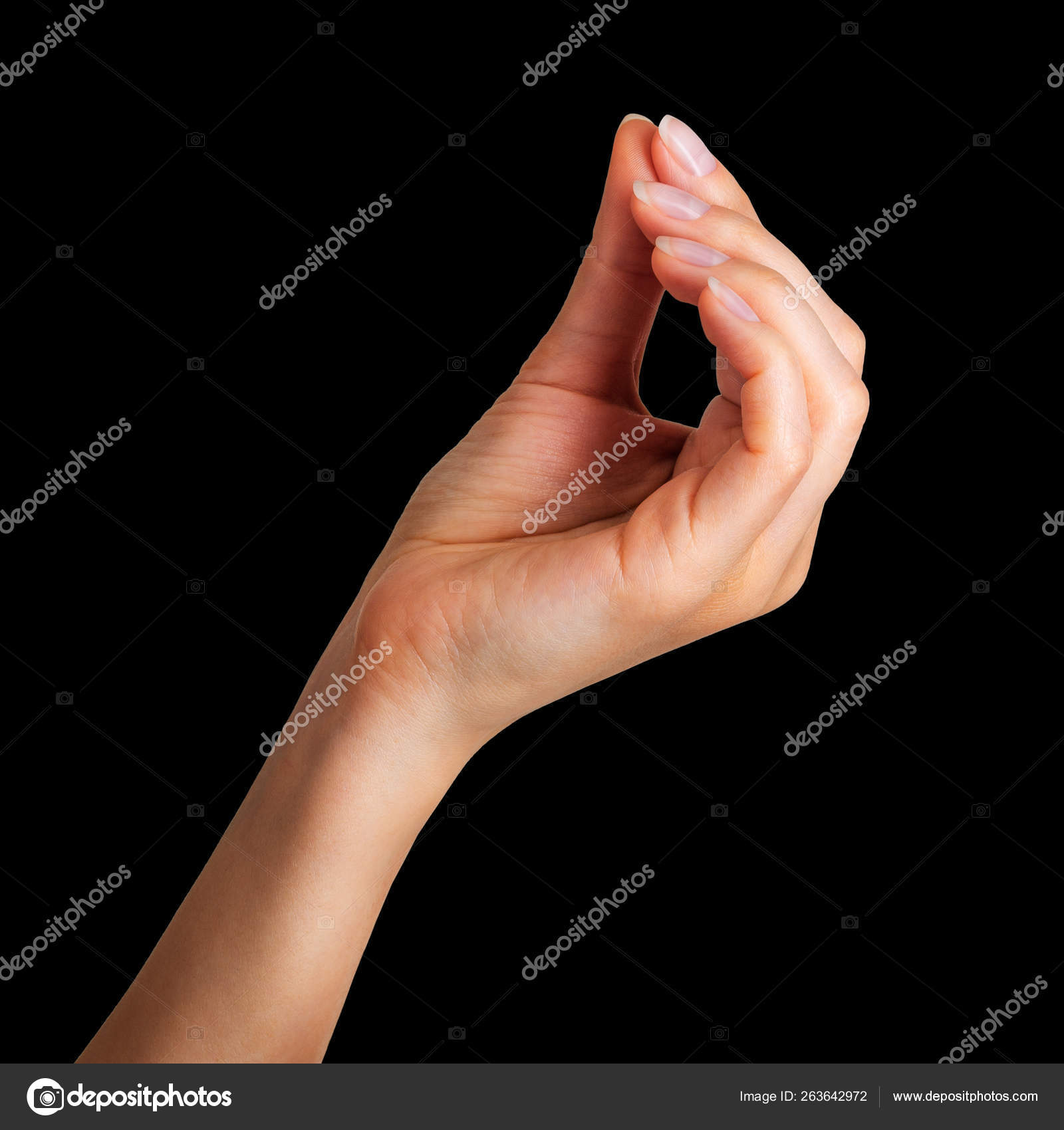 Woman hand holding something little with two fingers — Stock Photo © CheersGroup #263642972