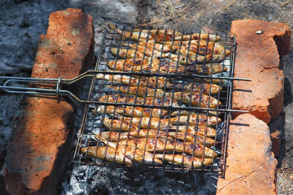 Tasty surmullet fish cooked fried roasted grilled baked outdoors on ...