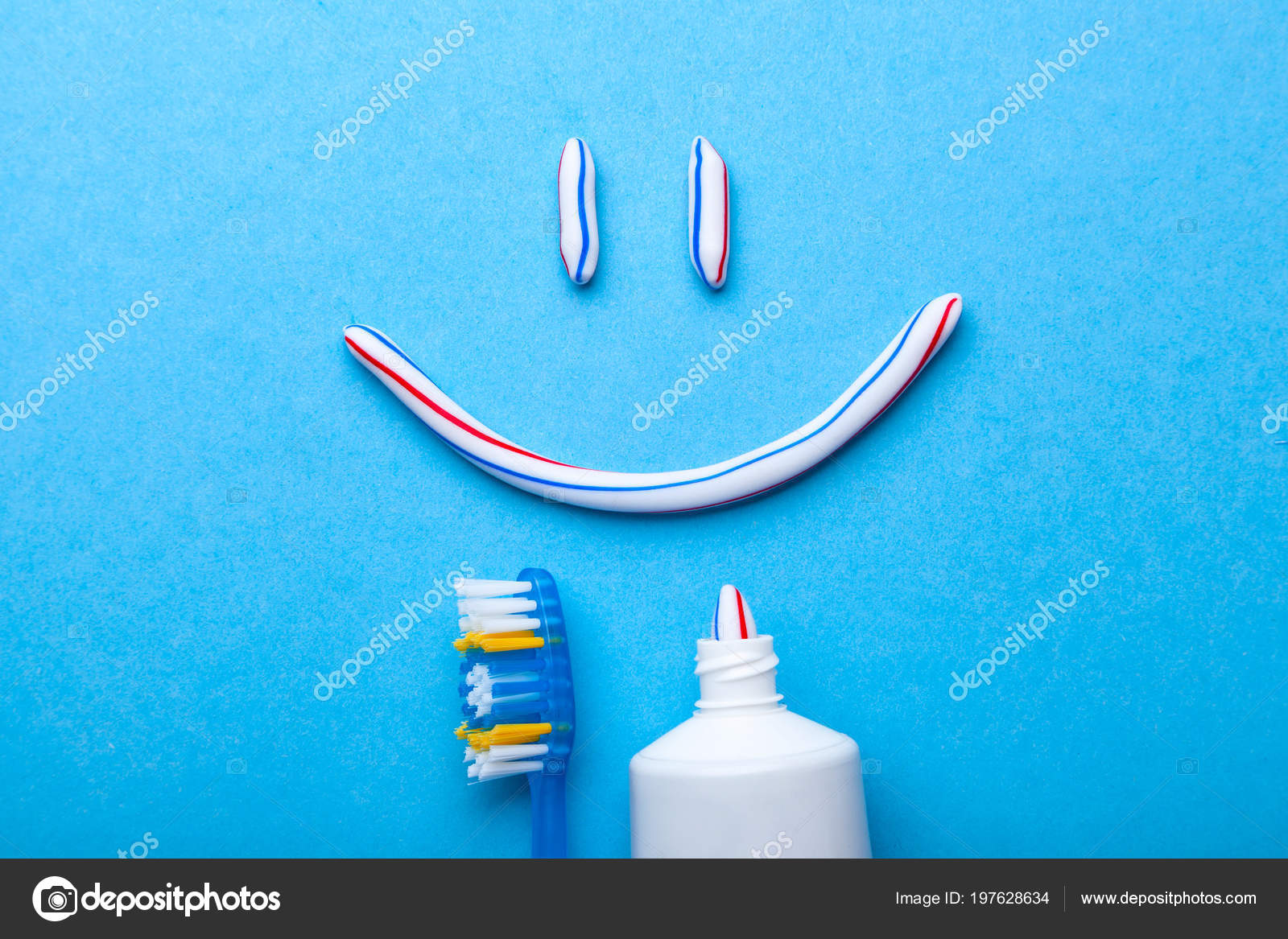 Tooth-paste in the form of a face with a smile. Tube of toothpaste and ...