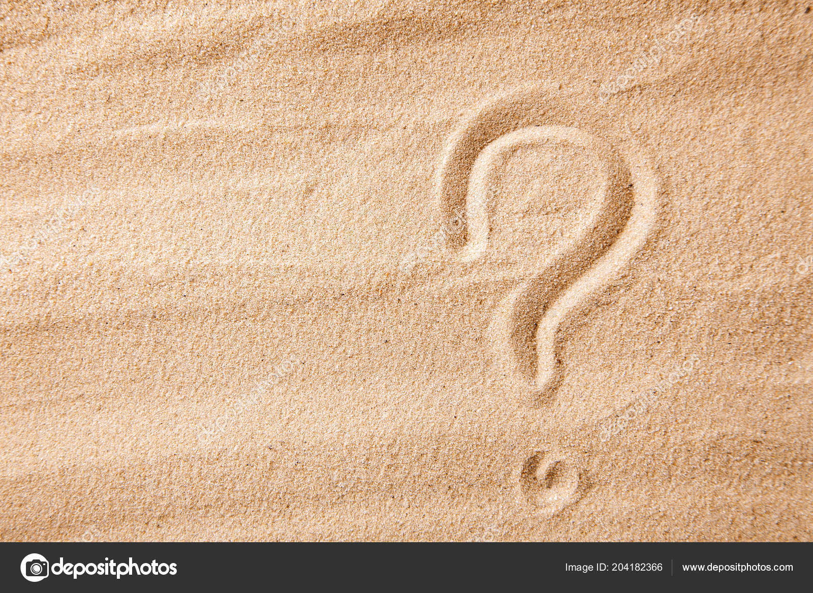 Question mark is sand painted on sand. Symbol of choice and doubt ...