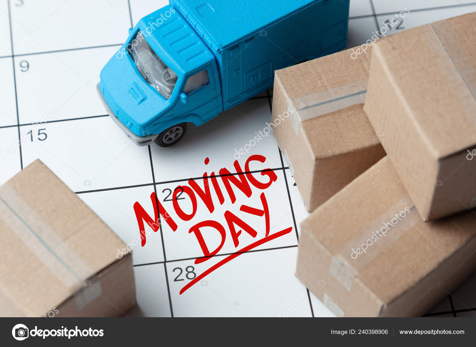 Moving day on the calendar is written in red. Calendar with a note with ...