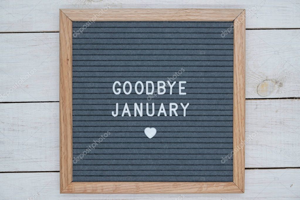 texto en inglés adiós enero y un signo de corazón en un tablero de ...