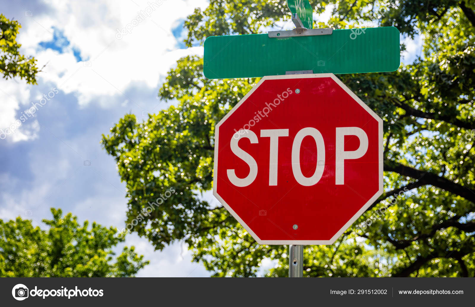 Stop sign against blue sky background. Sunny spring day Stock Photo by ...