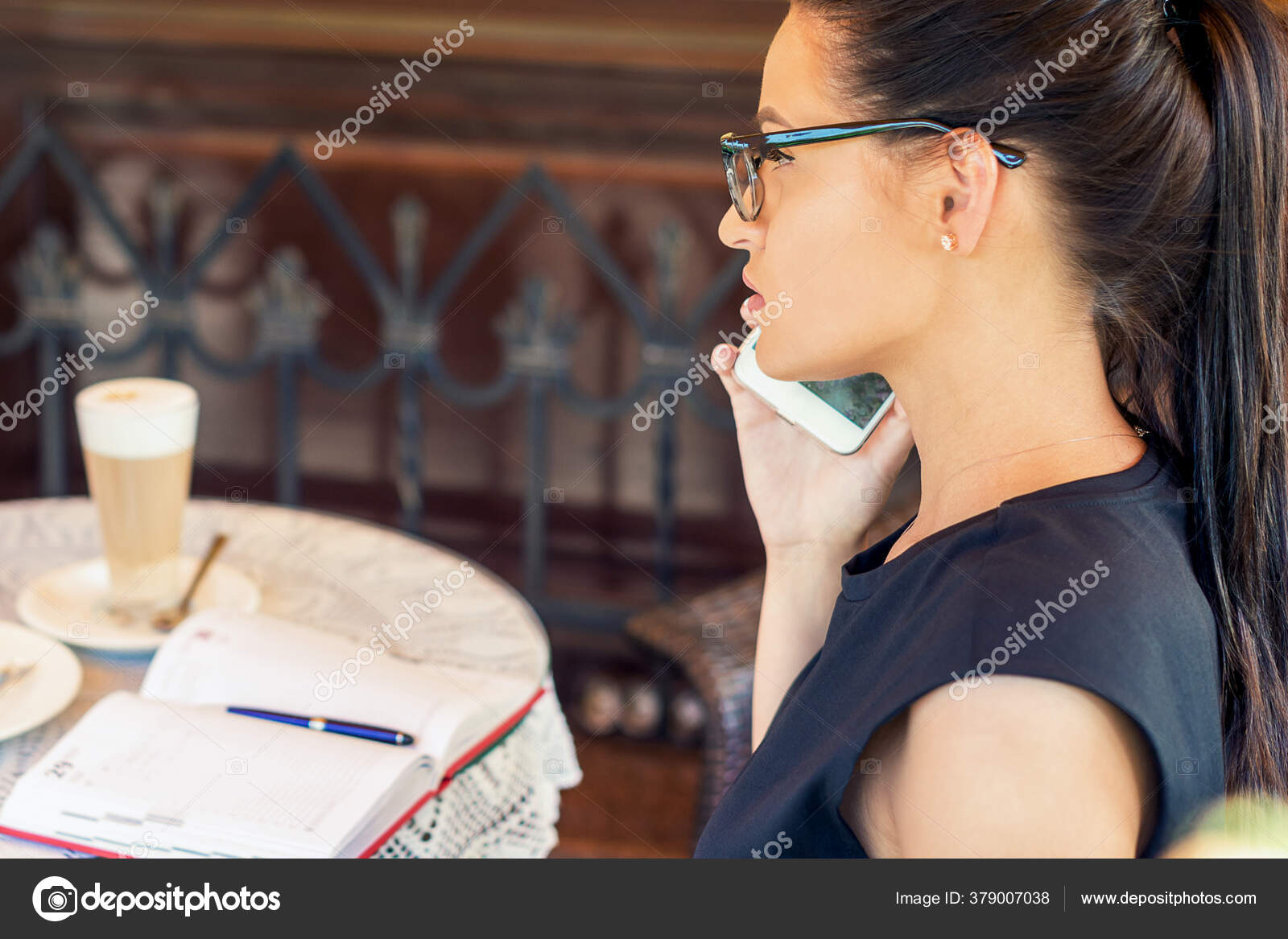 Side View Young Woman Speaking Mobile Phone Sitting Cafe Stock Photo by ...