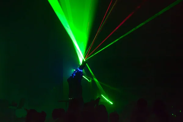 Colorful lights show. Laser show in motion in dark. - Stock Image ...