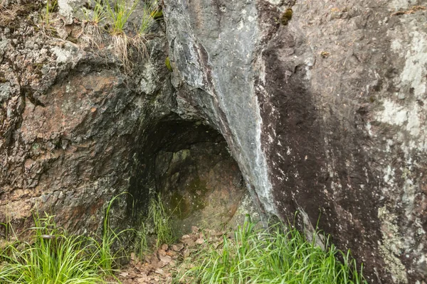 Hole in rock Stock Photos, Royalty Free Hole in rock Images | Depositphotos