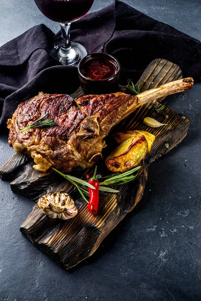 Cooking meat background. Fresh grilled meat on dark grey table ...