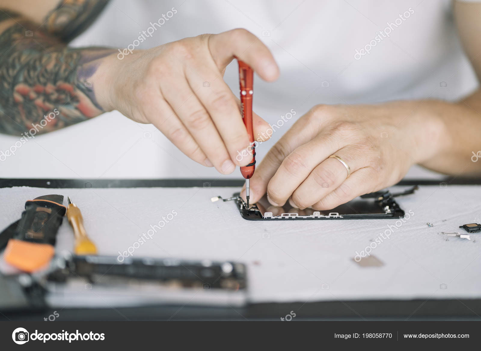 Electronics Repair Service Technician Disassembling Smartphone ...