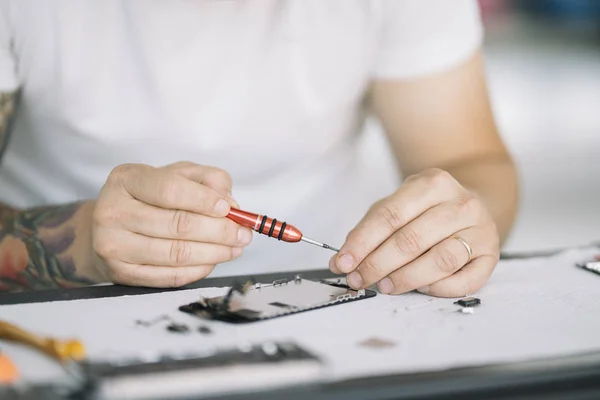 Electronics Repair Service Technician Disassembling Smartphone ...