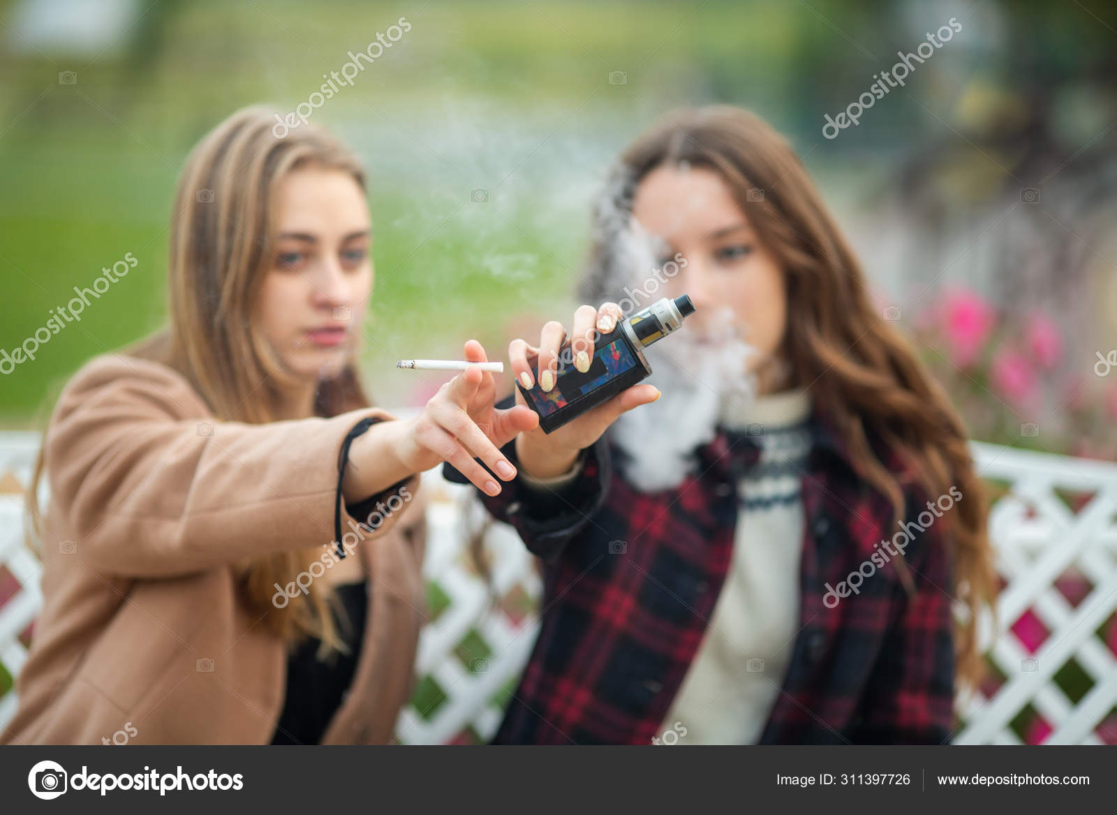 Smoking Vaping Young Beautiful White Teeage Girls Casual Clothes Sit ...