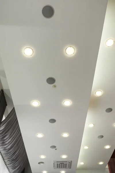 Modern layered ceiling with embedded lights and stretched ceiling inlay ...