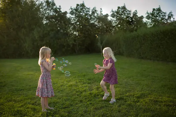 Kids playing bubble Stock Photos, Royalty Free Kids playing bubble ...