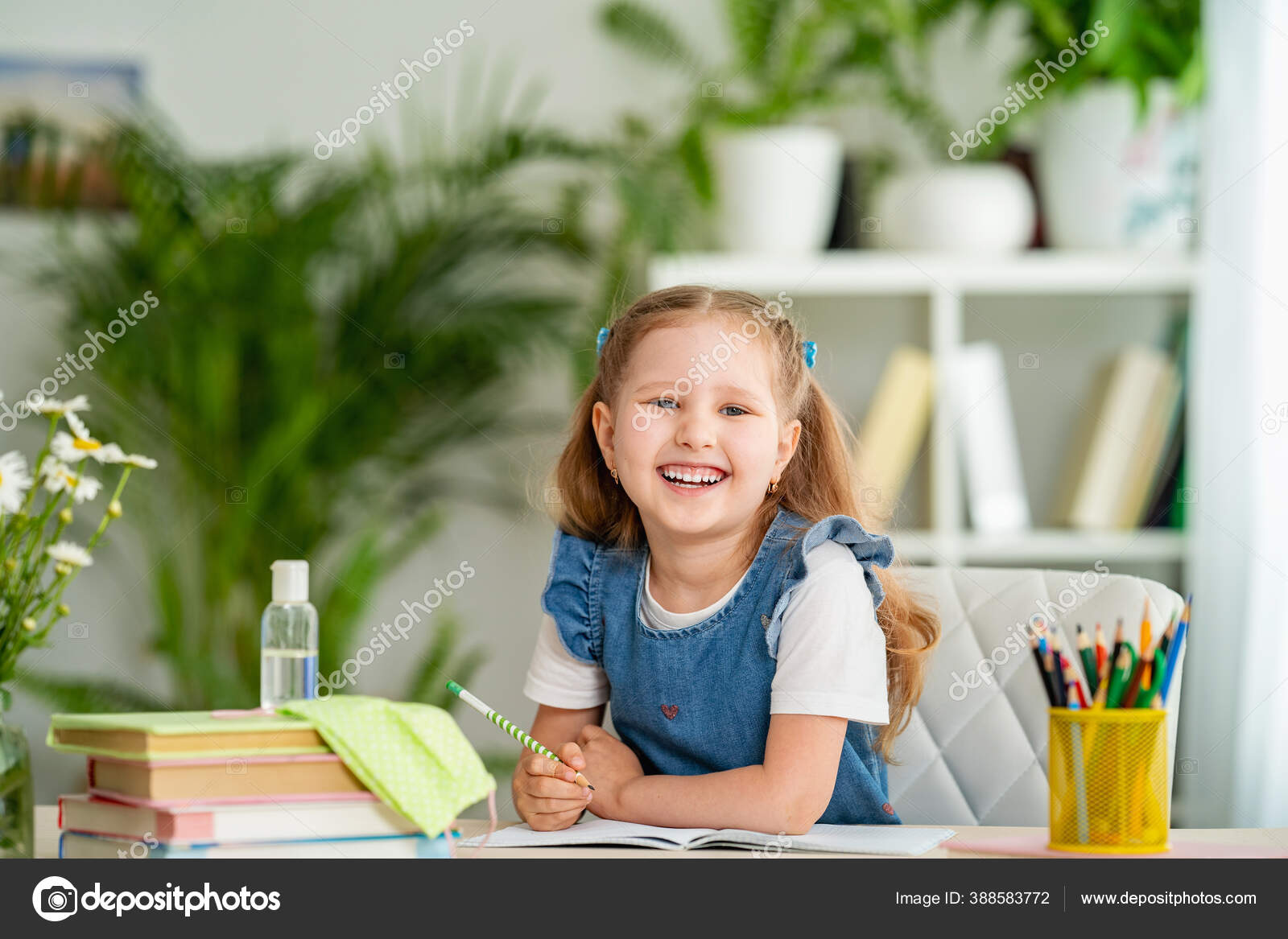 Little Girl Sitting Table Doing Homework Home Child Smiles Happily ...