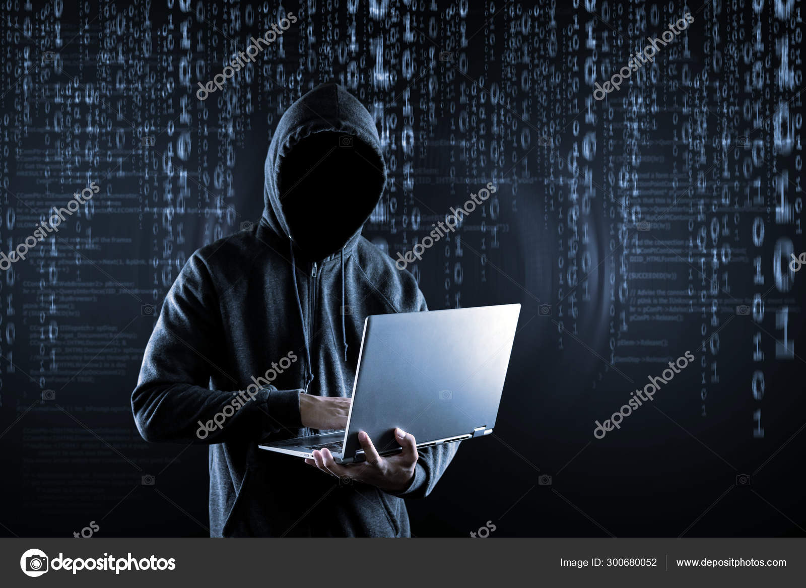 Cybercrime, hacking and technology crime. no face hacker with la ...