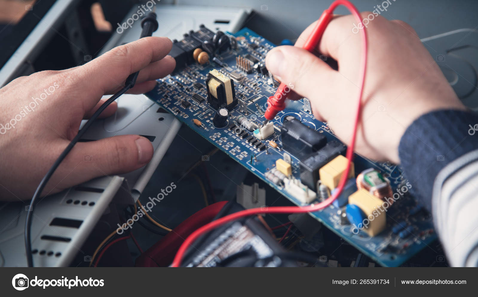 Man checking computer with a multimeter. — Stock Photo © ANDRANIK2017 ...