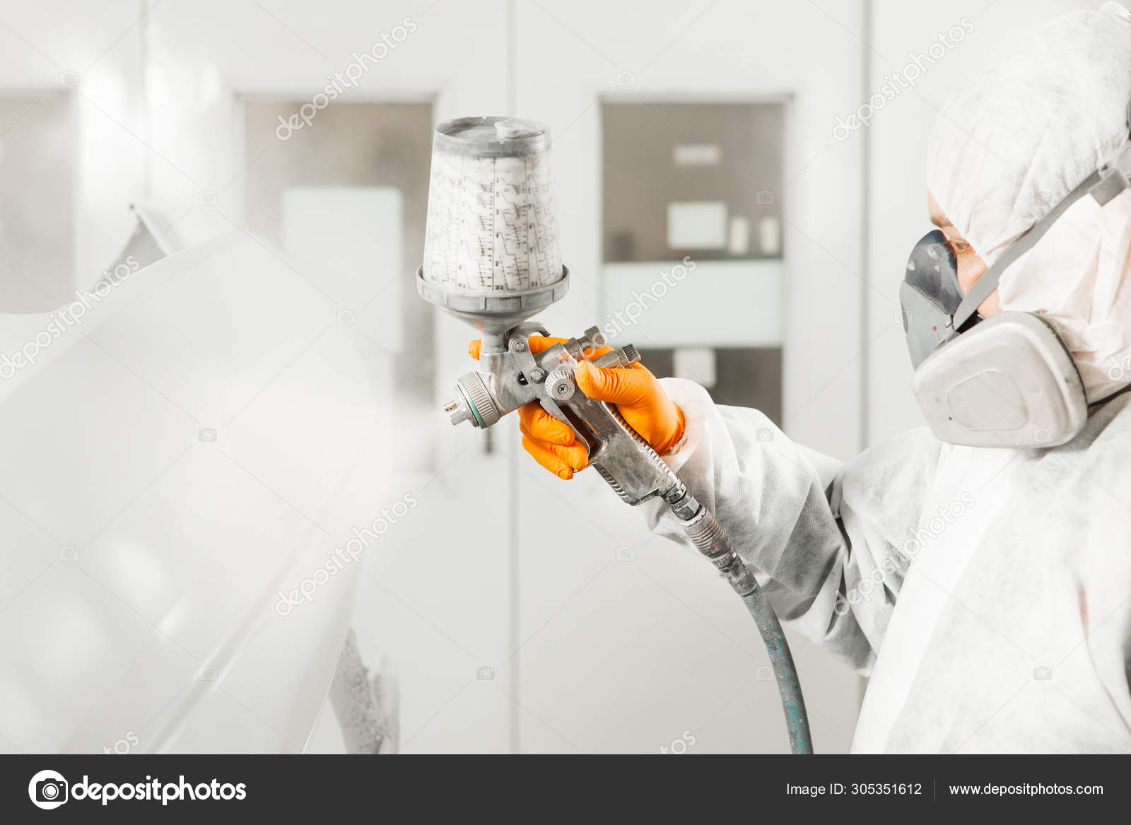 Spraying the paint to the car Car. Paint coating business. Stock Photo ...