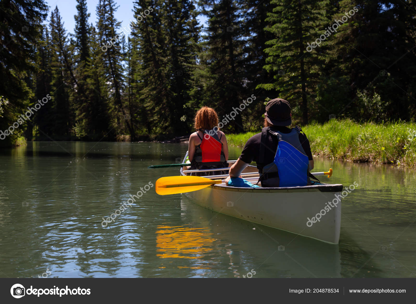 Couple Adventurous Friends Canoeing River Surrounded Canadian Nature ...