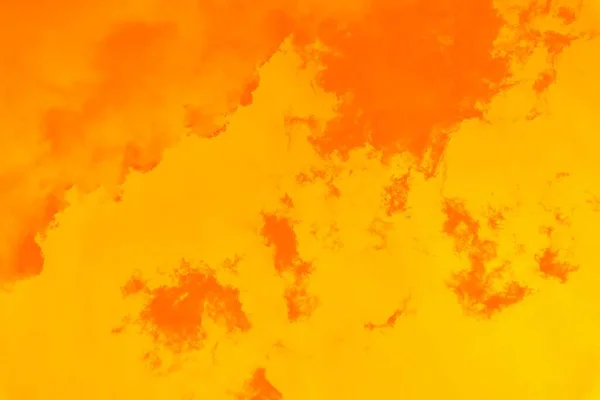 Lush lava hot orange color sky with cirrocumulus clouds. Whirlpool ...